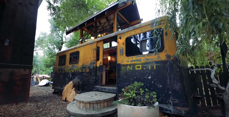 Old train car converted into tiny house from another time