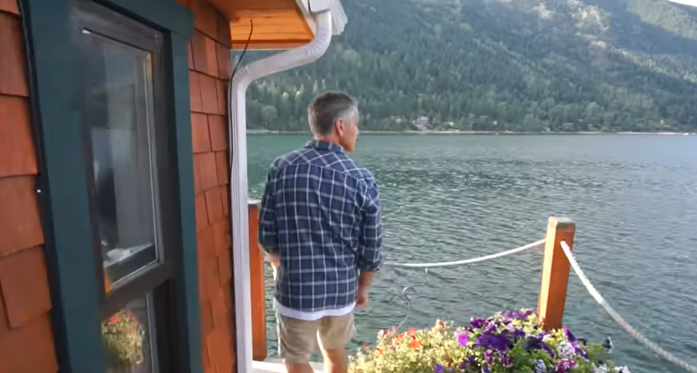 Man builds impressive 2-story tiny home that floats, has a wraparound ...