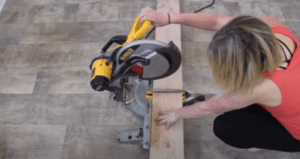 Woman shows the easiest way to make an indoor bench and it only costs $15