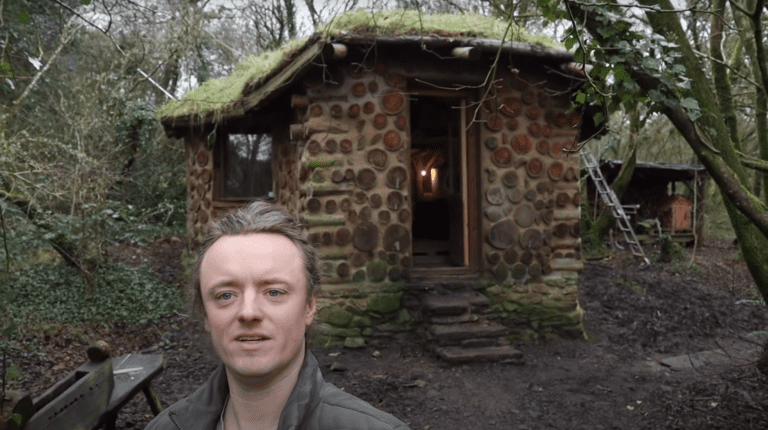 Man lets camera enter his tiny home in the woods