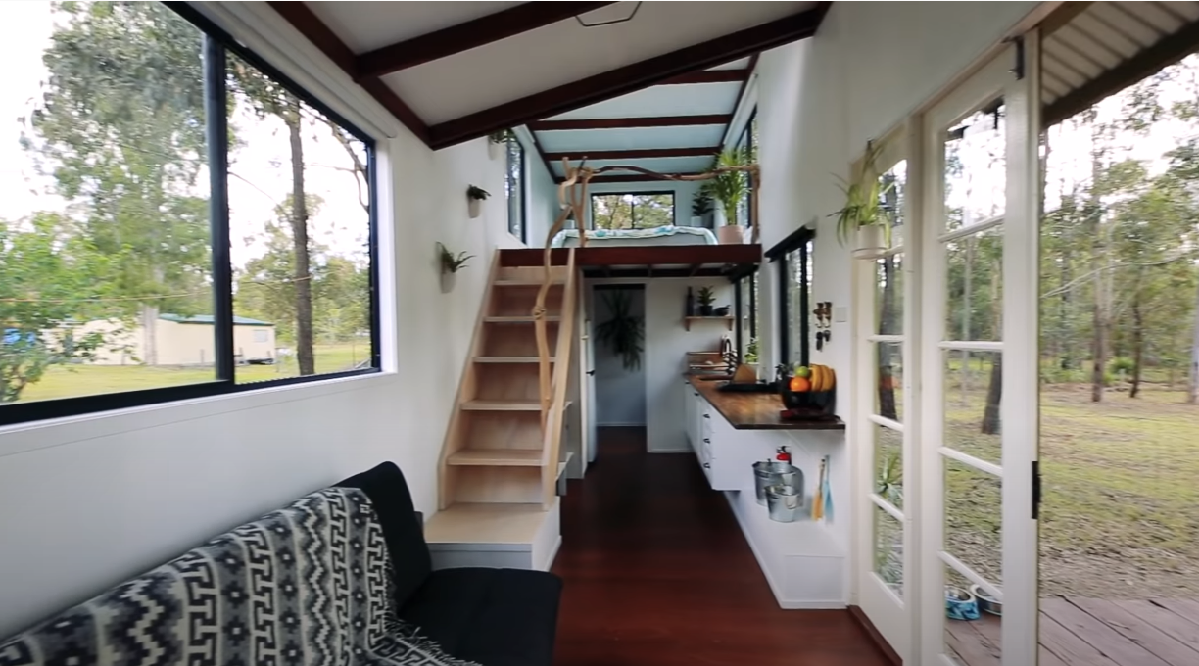 Young couple transform an old caravan trailer into their dream home for ...