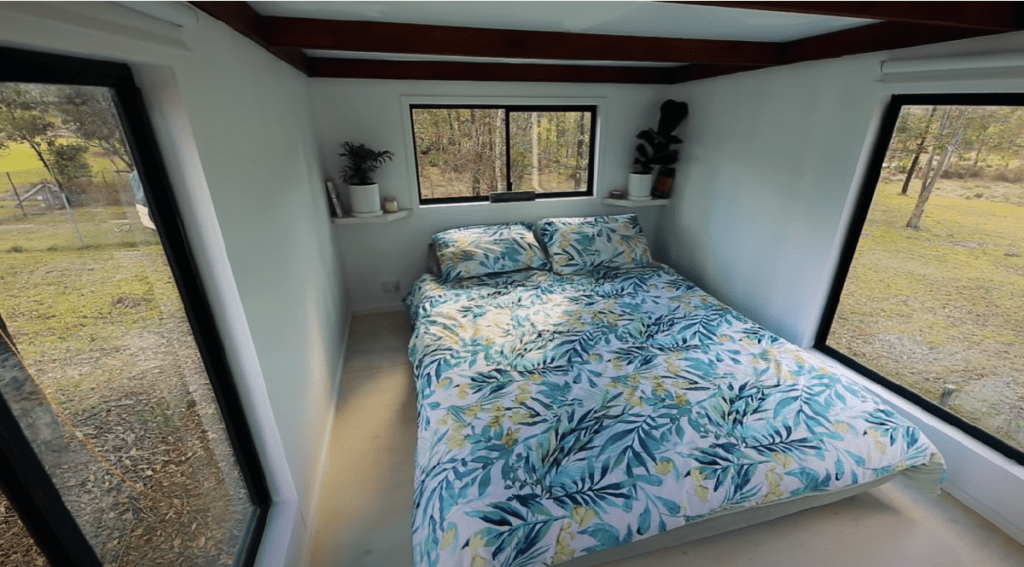 Young couple transform an old caravan trailer into their dream home for ...