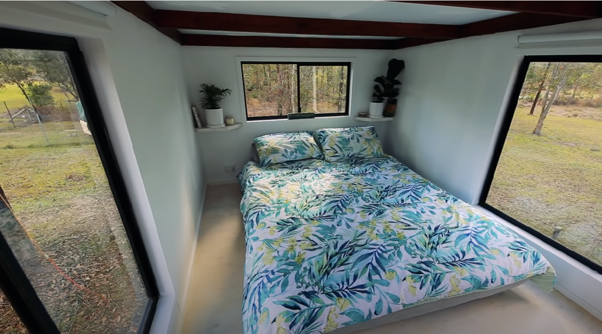 Young couple transform an old caravan trailer into their dream home for ...