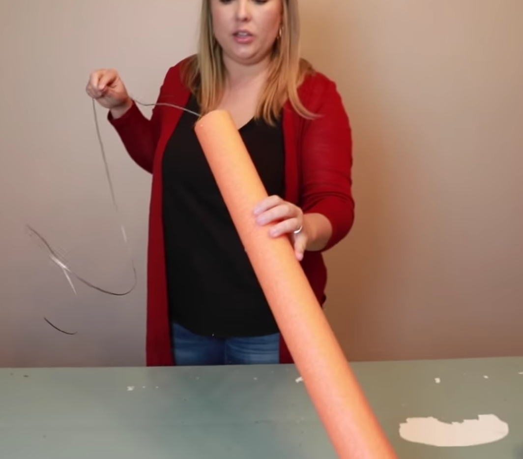 Mom uses pool noodles to create fantastic candy cane ornament for front ...