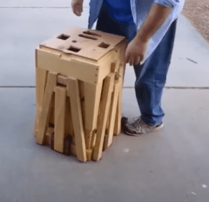Man’s Design Turns Small Box Into Table That Seats Four Men