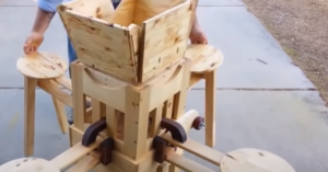 Man’s Design Turns Small Box Into Table That Seats Four Men