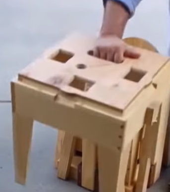 Man’s Design Turns Small Box Into Table That Seats Four Men