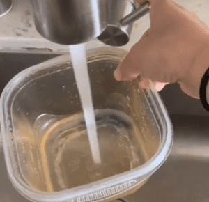 Woman uses a paper towel “trick” to remove greasy orange stains in ...