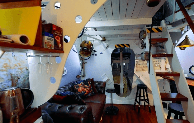 Couple lives in 'submarine' tiny home with seriously impressive interior