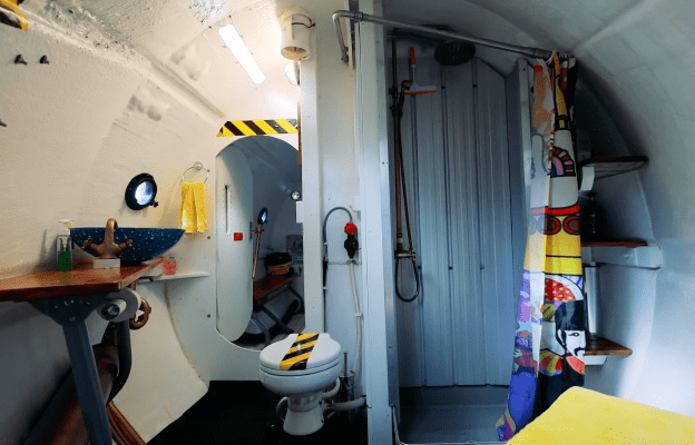 Couple lives in 'submarine' tiny home with seriously impressive interior