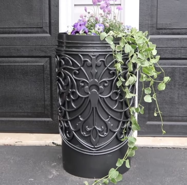 Transform a garbage can and $9 doormat into a fancy-looking planter