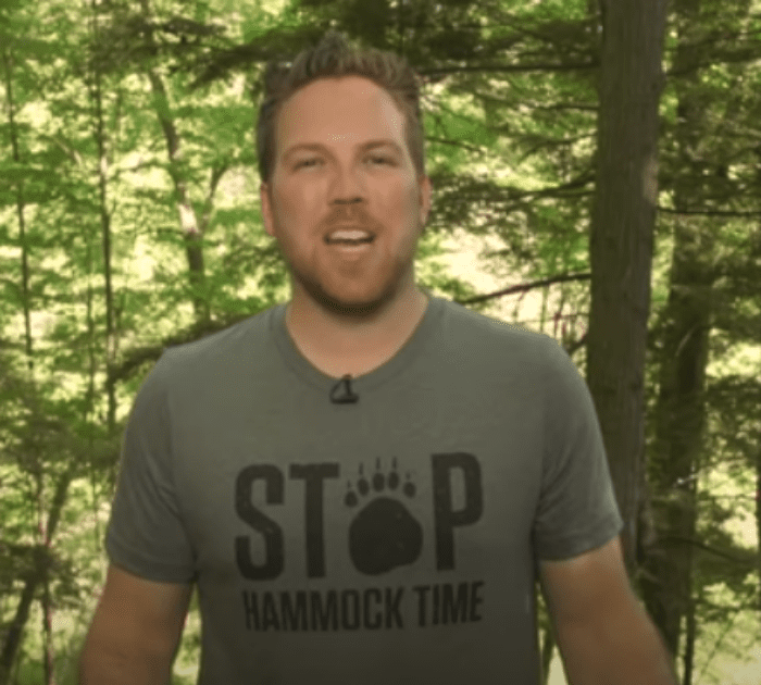 Man stacks cinder blocks then adds one more item to make modern bench ...