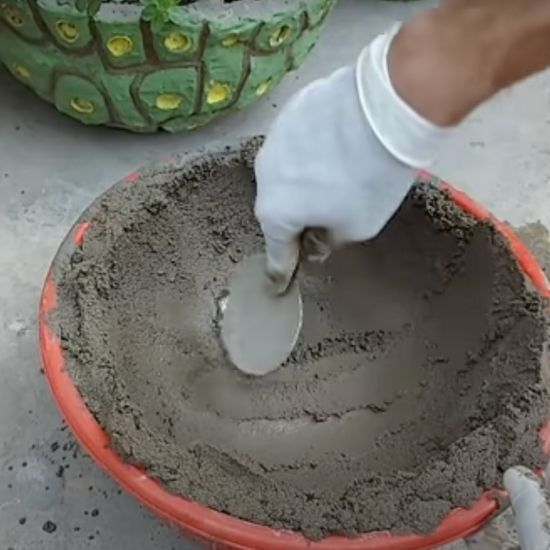 Gardener shows how to make cement flower pots with common household items