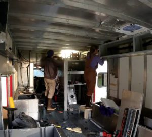 Couple converts ambulance into incredible tiny home with a hot tub