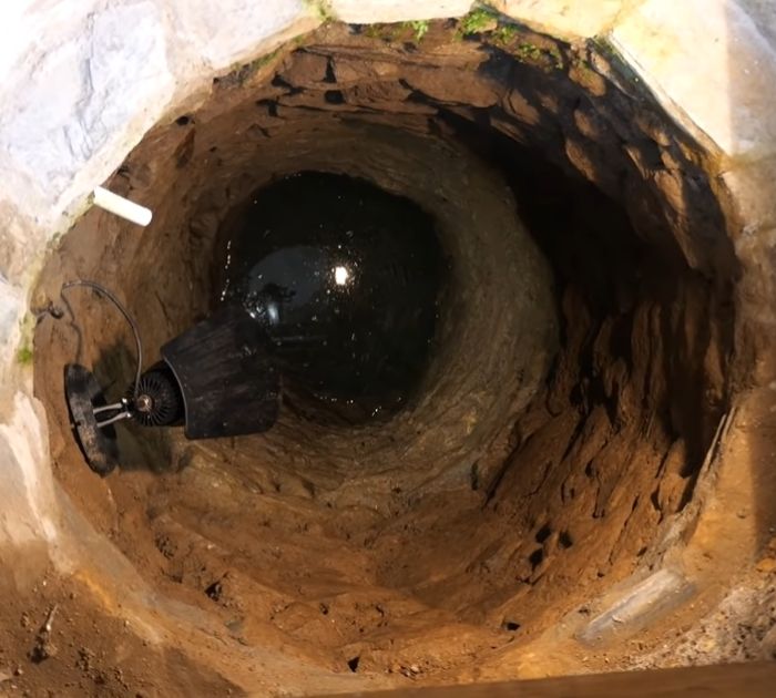 Grandad discovers a 17-foot medieval well in the middle of his living room