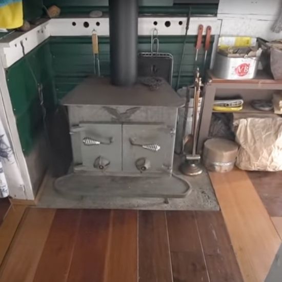 Man builds incredible self-sustaining island homestead from salvaged ...