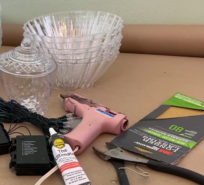 Lady strings lights through Dollar Tree bowls for beautiful Christmas ...