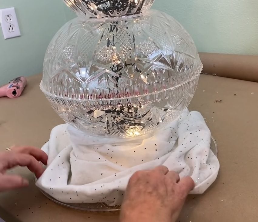 Lady strings lights through Dollar Tree bowls for beautiful Christmas ...