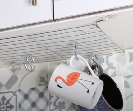 Woman uses dollar store cooling racks to brilliantly organize her home