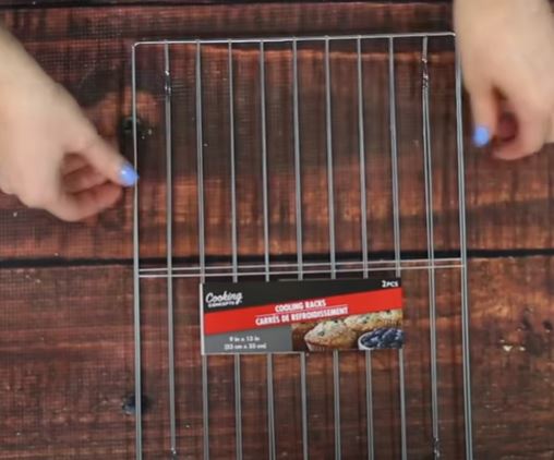 Woman uses dollar store cooling racks to brilliantly organize her home