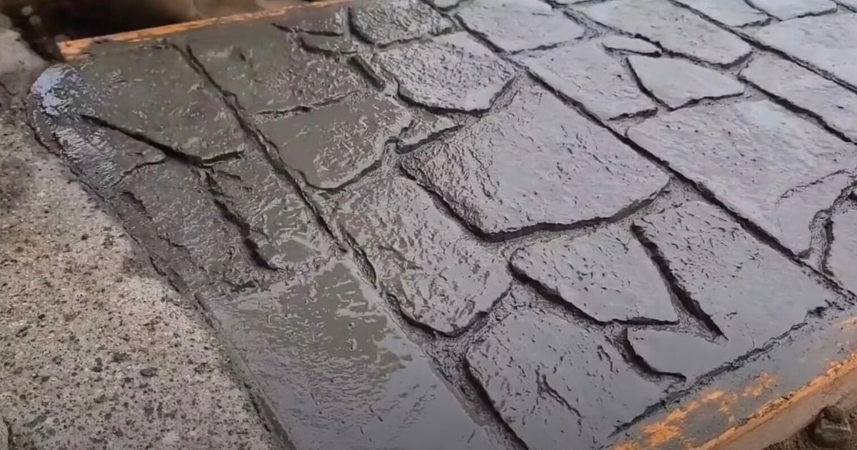 Make beautiful garden paths with cement and “stone stamps”