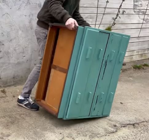 Guy finds a beat-up dresser on the side of the road and gives it an ...