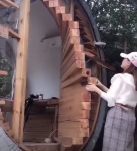Young man turns concrete pipe into an incredible cabin home