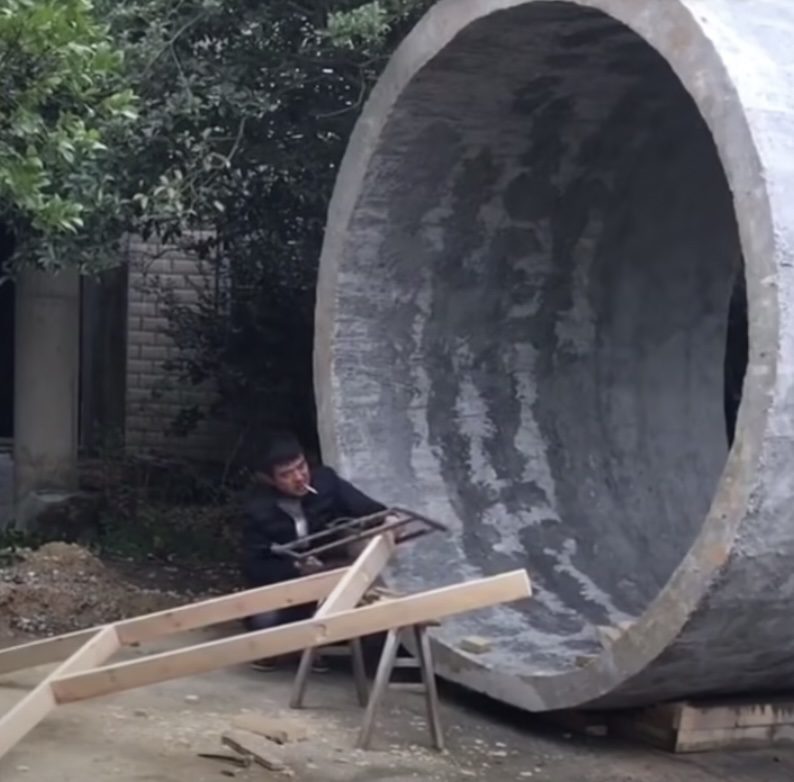 Young man turns concrete pipe into an incredible cabin home