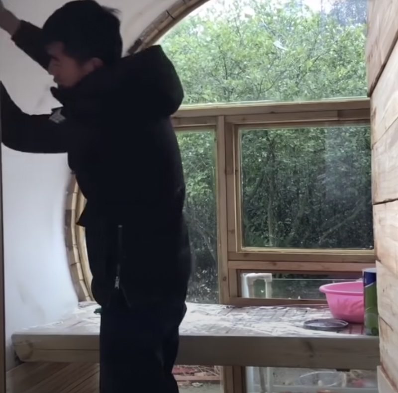 Young man turns concrete pipe into an incredible cabin home