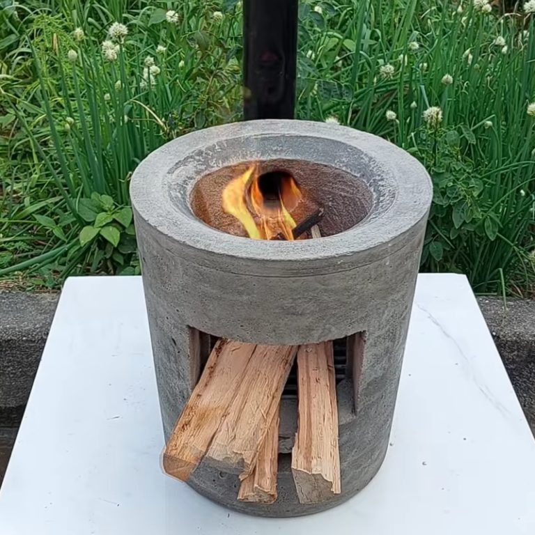 Man uses cement and two buckets to create smokeless outdoor stove