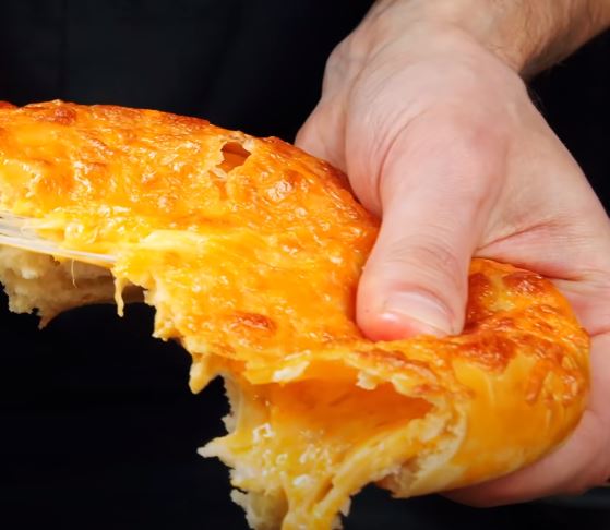 Fold a ball of cheese into dough with spices for the tastiest decadent ...