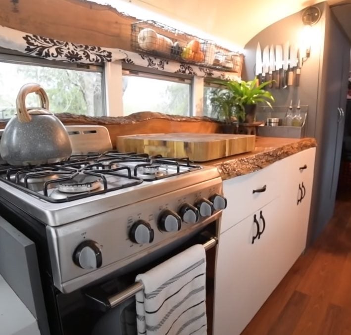 Guy living in a school bus puts a large chef-designed kitchen inside ...