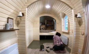 Woman converts a prefab home into a unique fairytale cottage