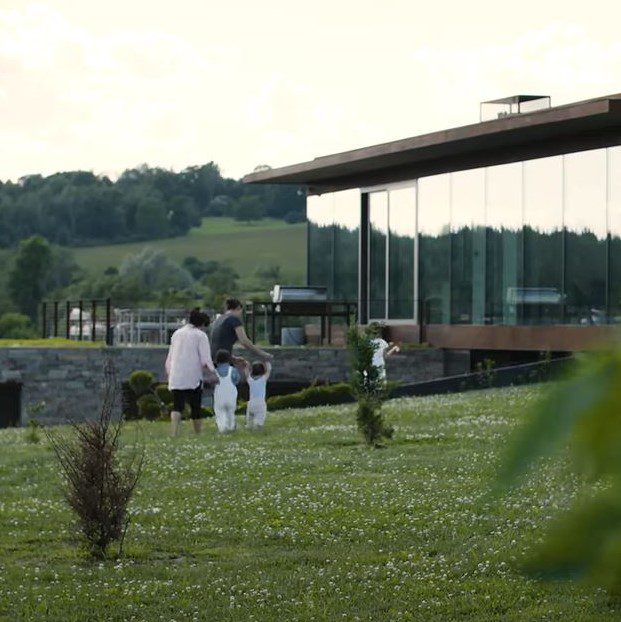 Family gives a peek inside their unique glass house that has the most ...