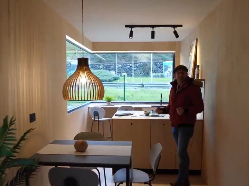 Man stacks three shipping containers without welding to create ...