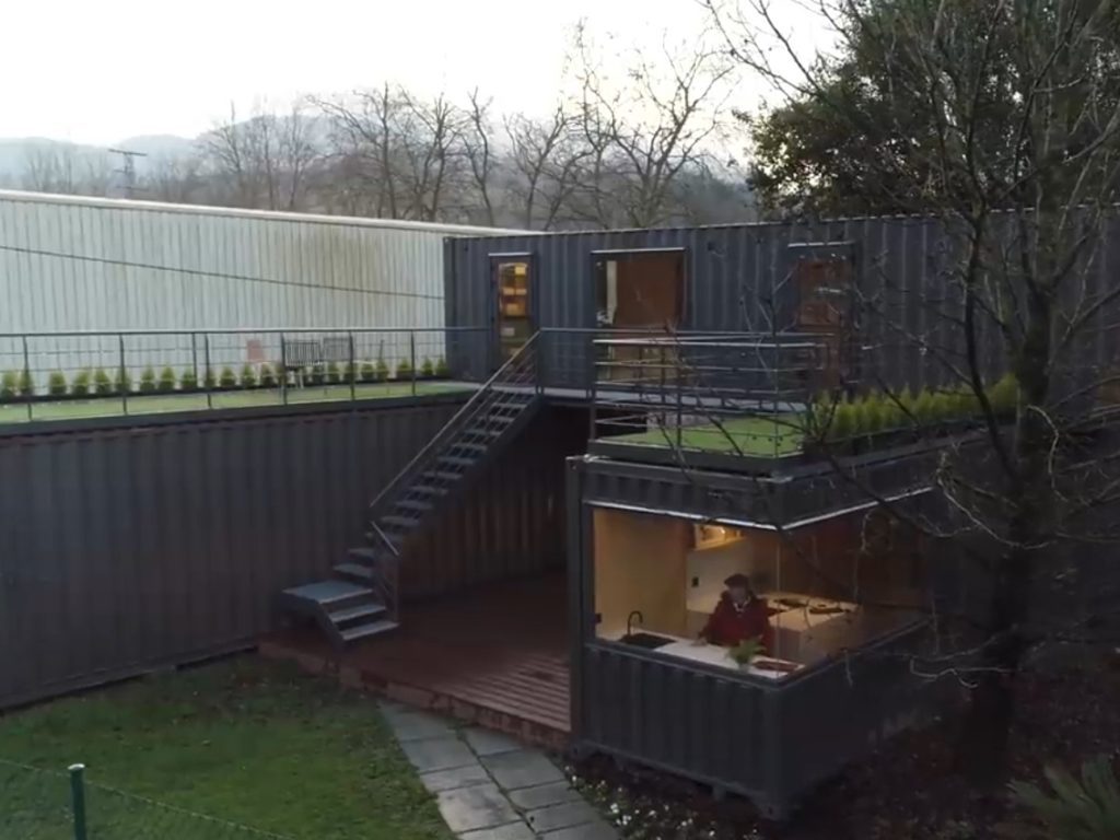 Man stacks three shipping containers without welding to create ...