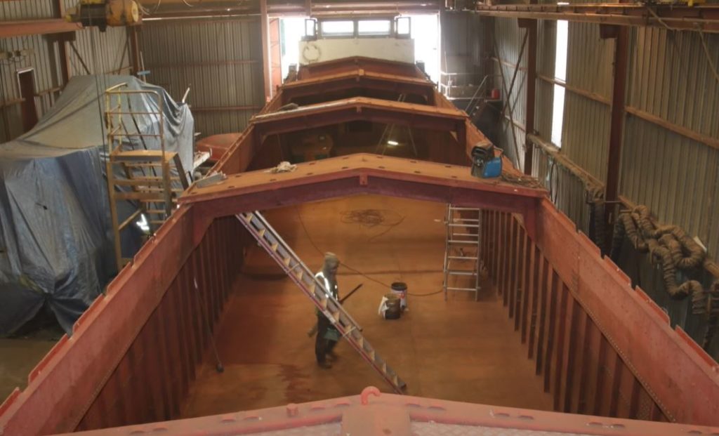 Couple transforms giant, old cargo boat into a beautiful modern home