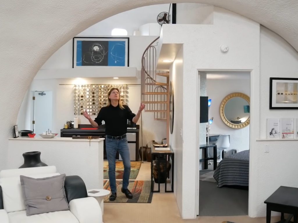 Man inflates huge balloons and sprays them with foam to create ...