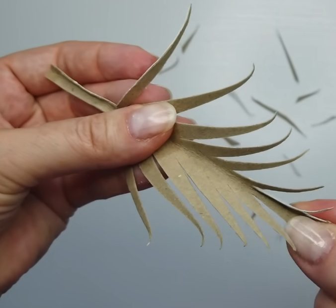 Woman cuts up cardboard roll holders to make some of the most beautiful ...