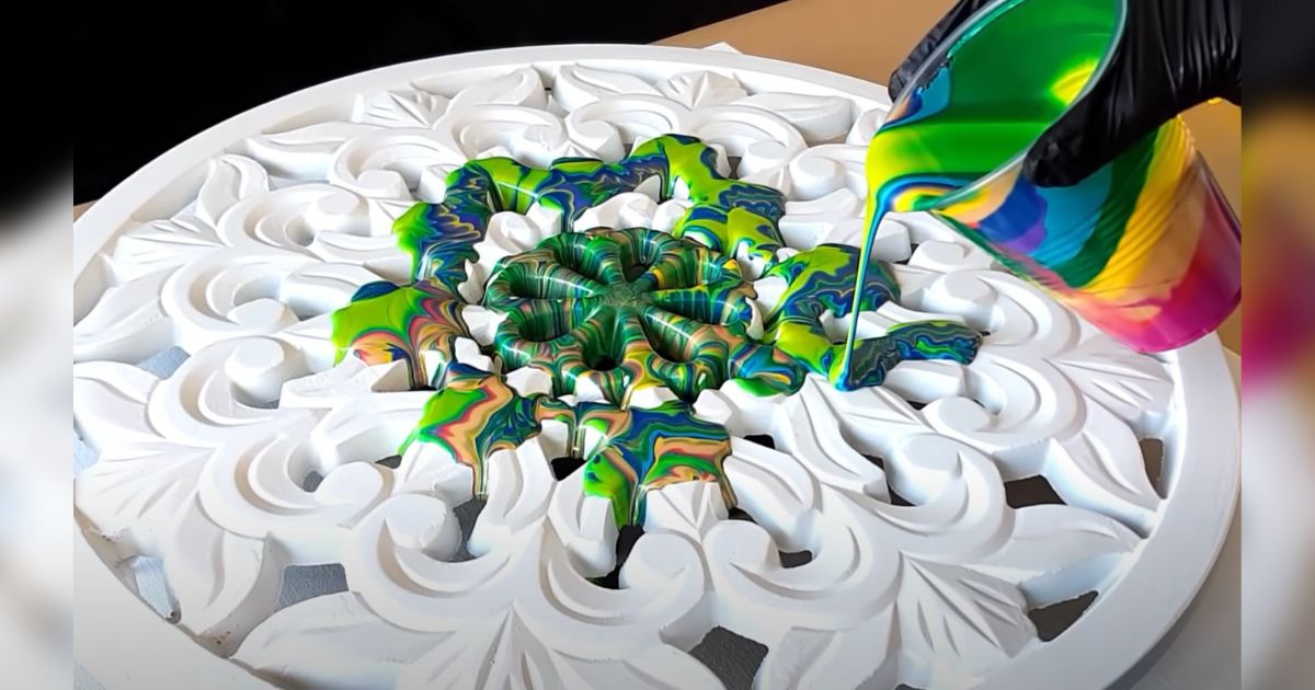 Artist pours acrylic paint over wooden mandala on canvas and gains 16M ...