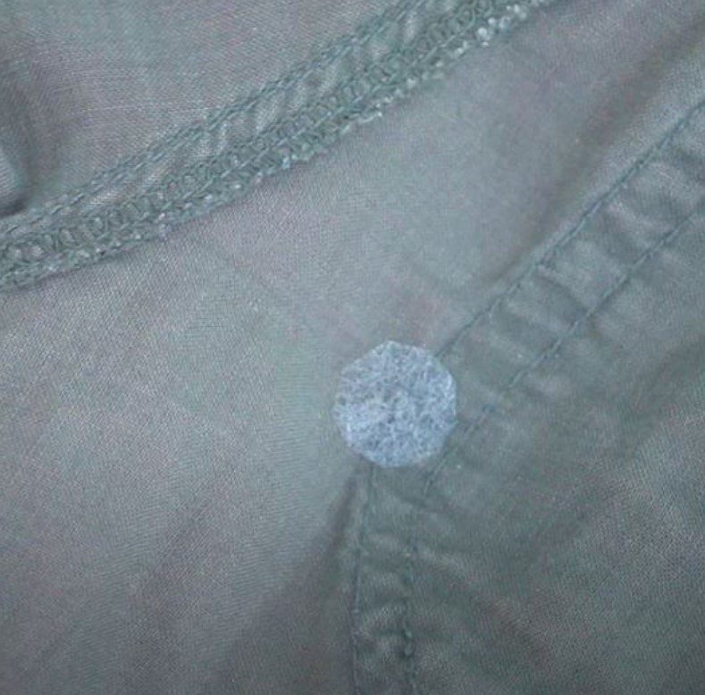 Homemaker shows simple way to repair holes in clothing without needle ...
