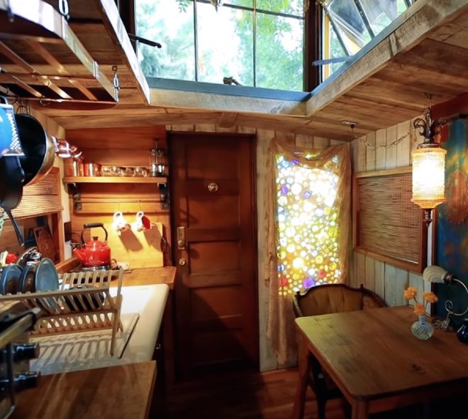 Couple turns WW2 traincar into a magical tiny home from another time