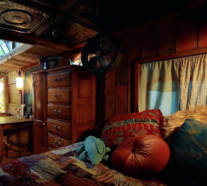 Couple turns WW2 traincar into a magical tiny home from another time