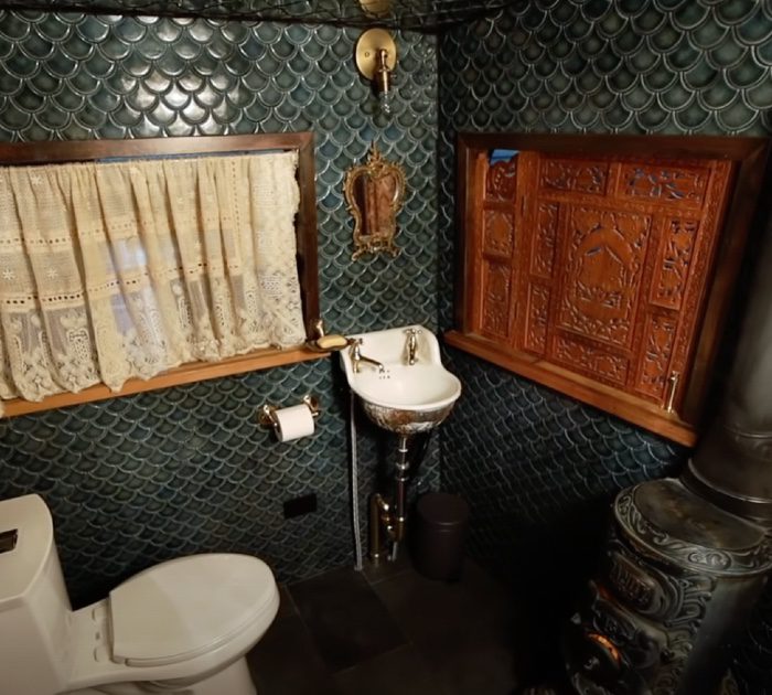 Couple turns WW2 traincar into a magical tiny home from another time