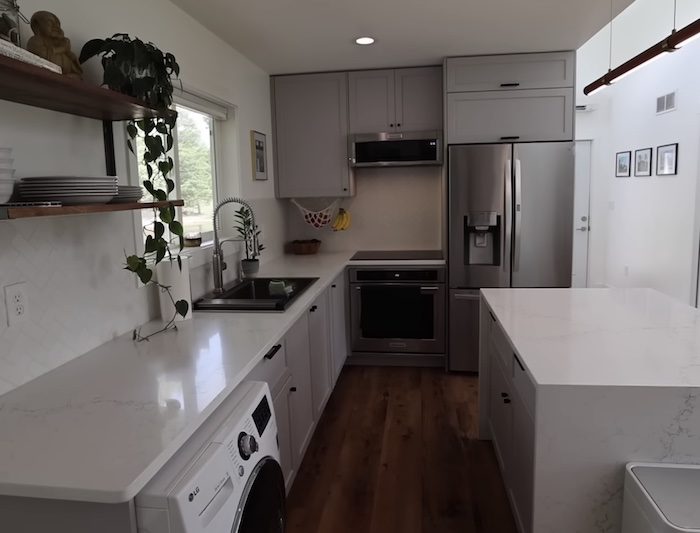 Couple turn 2 shipping containers into home of dreams & sell everything ...