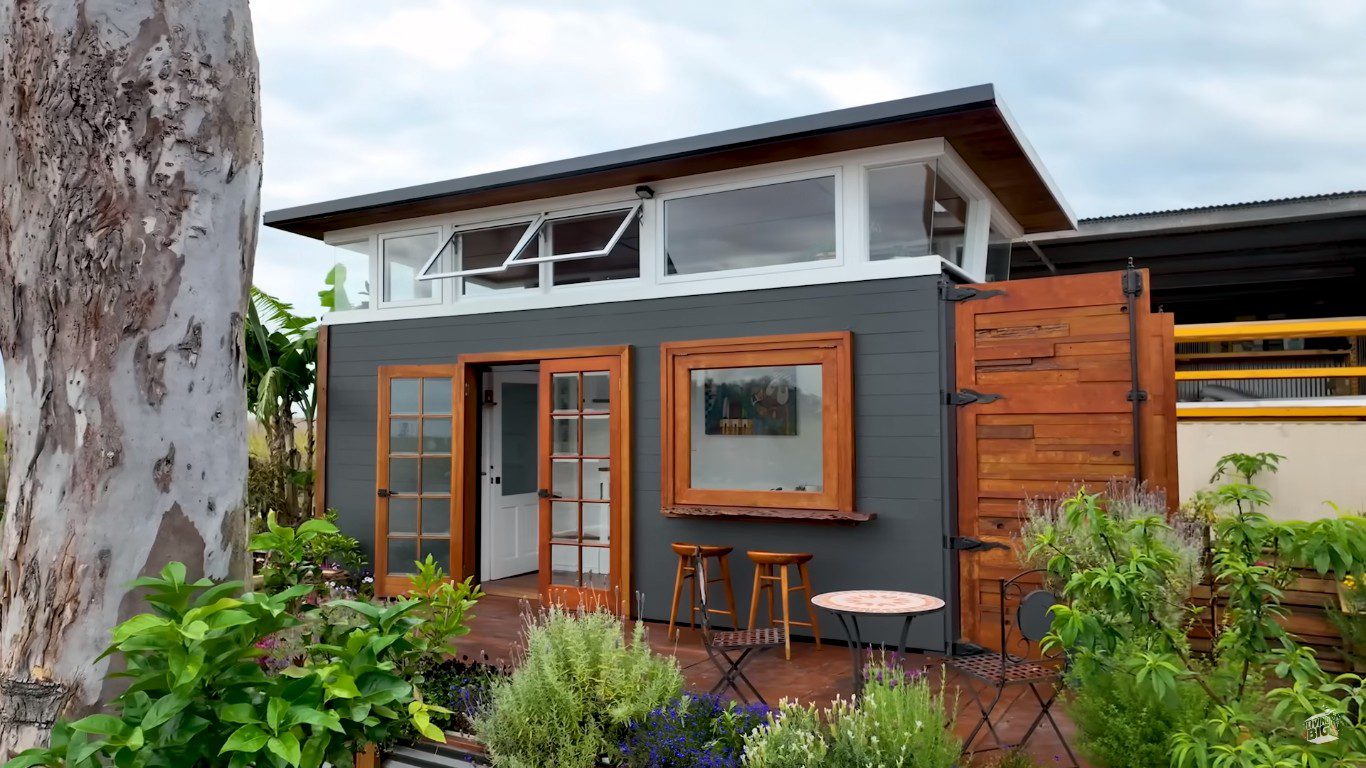 Couple take a low cost shipping container & modernize it with a raised ...