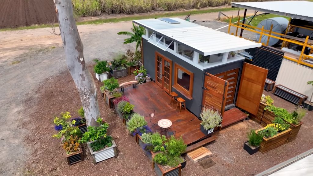 Couple take a low cost shipping container & modernize it with a raised ...