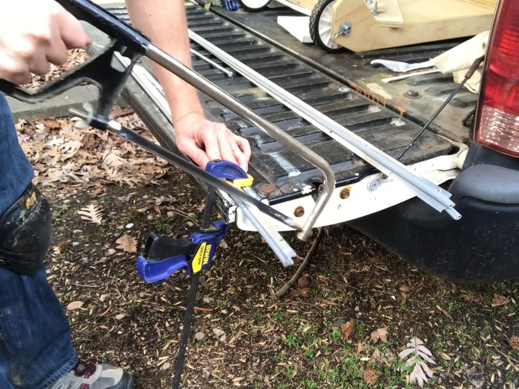 Man shows how to add weather stripping to old doors to keep heat in and ...