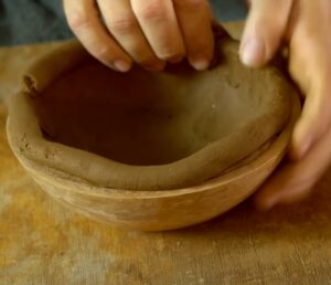 Man shows how to make homemade pottery without a kiln or pottery wheel ...