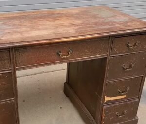 Mom’s given an old beat-up desk and she makes it beautifully unrecognizable